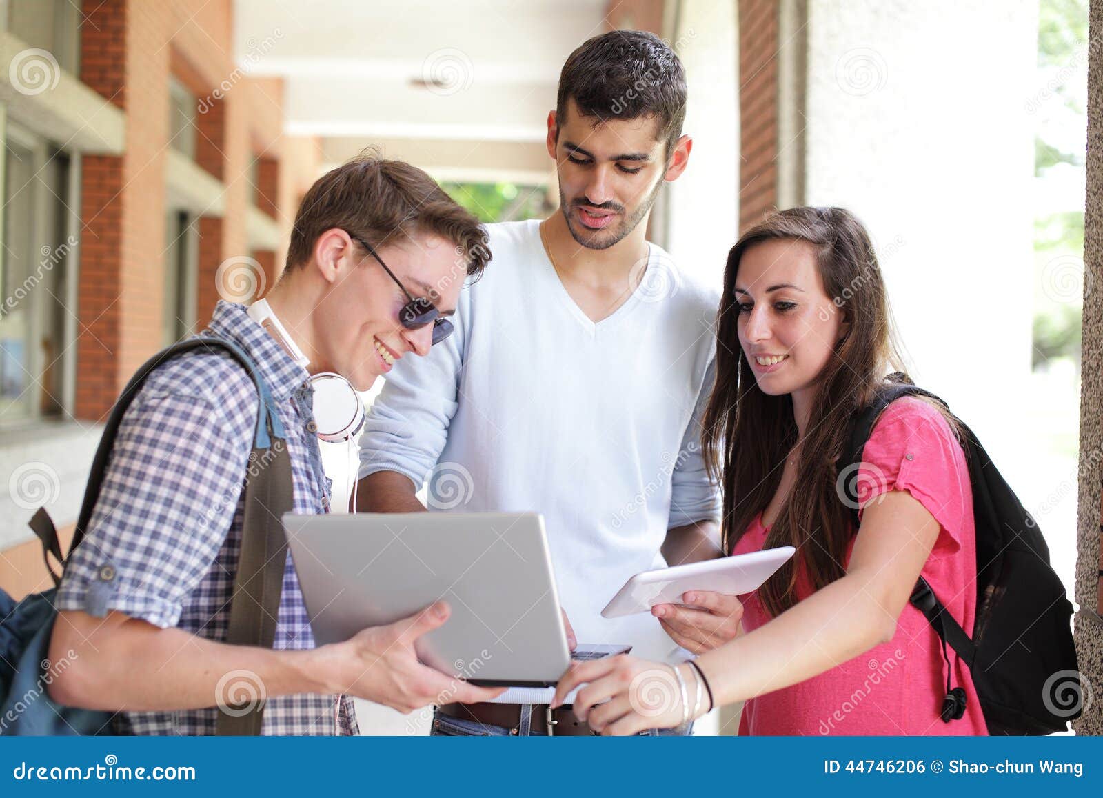 Happy College Students Using Computer Stock Photo - Image of caucasian ...