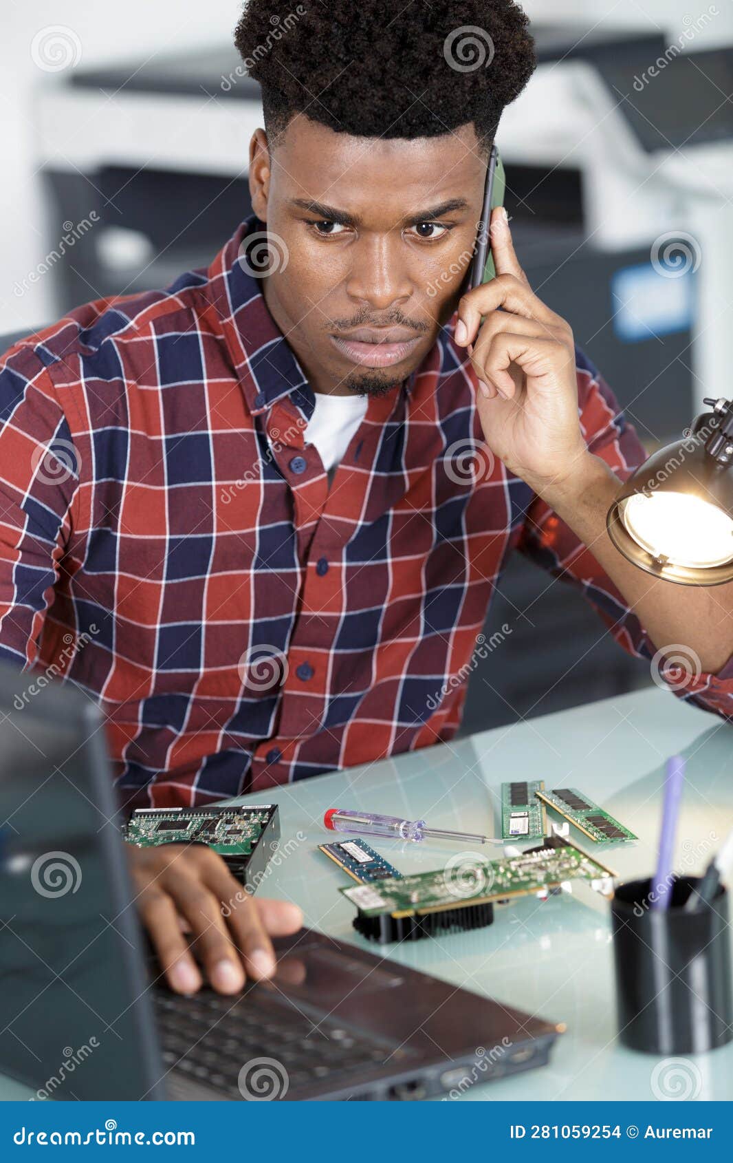 Happy Computer Technician on Phone Talking To Customer Stock Photo ...