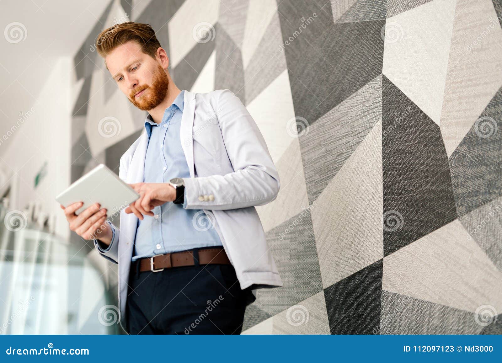 Happy and Confident Businessman Using Tablet Stock Image - Image of ... Happy and Confident Businessman Using Tablet Stock Image - Image of ...