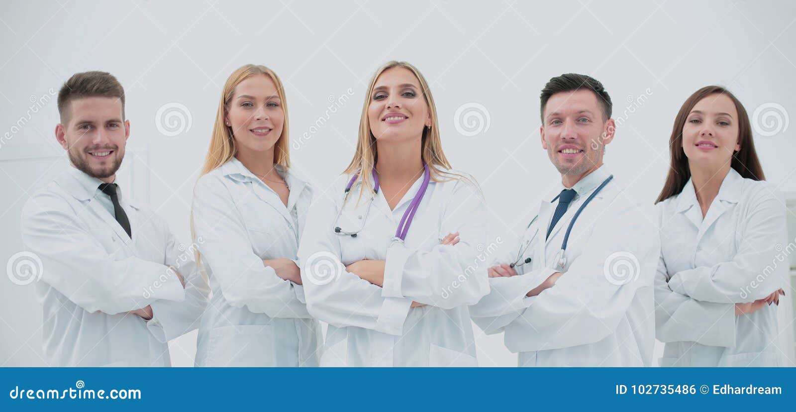 Confident Doctors Posing and Smiling at Camera Stock Photo - Image of ...