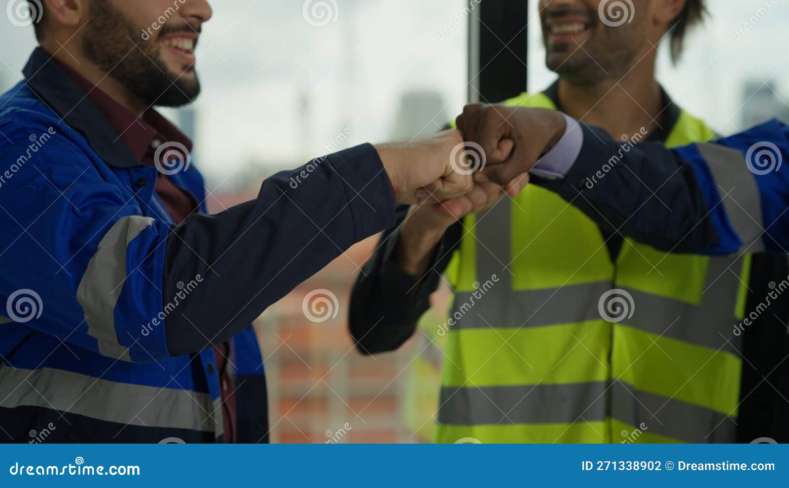 Happy Construction Workers at Construction Site Stock Photo - Image of ...