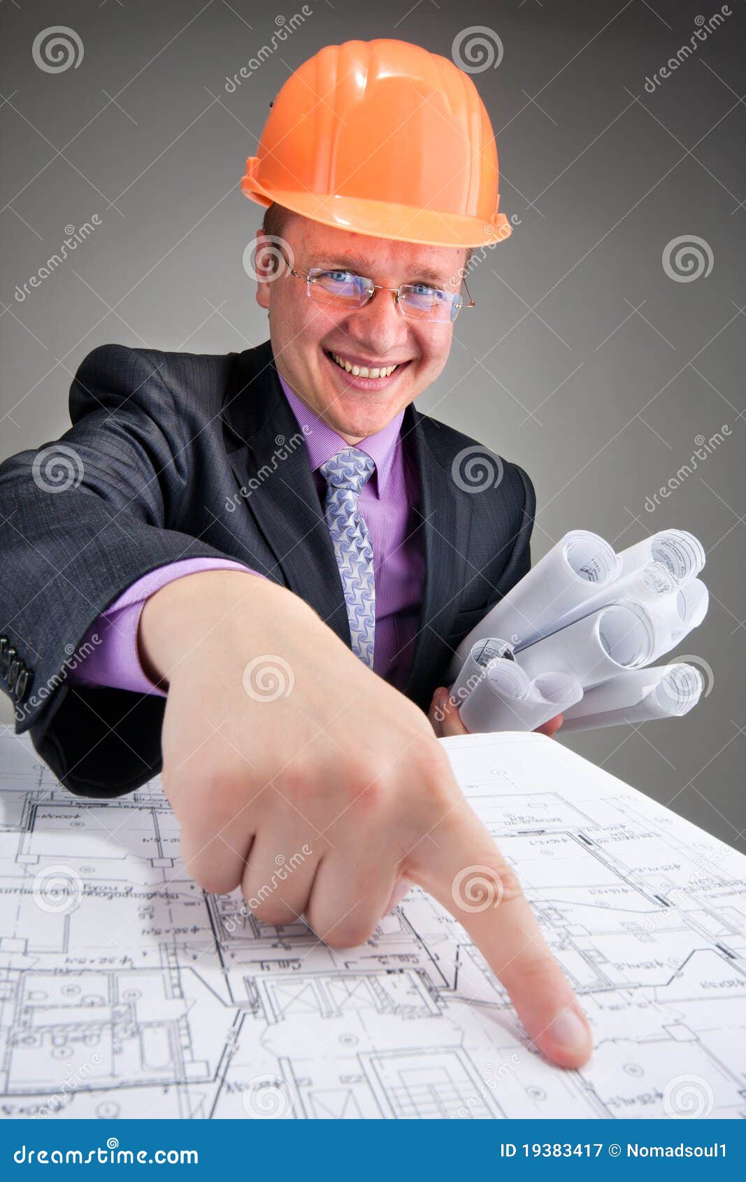Happy Contractor Pointing To Plans Stock Image - Image of construction ...