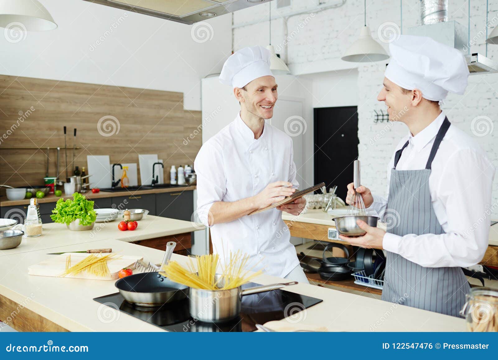 Happy Cook Talking To Intern at Cooking Class Stock Photo - Image of ...