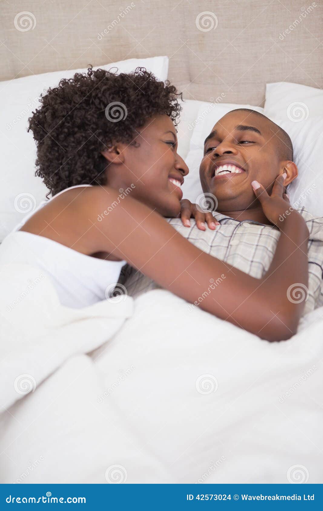 Happy Couple in Bed Together Stock Photo - Image of angle, tank: 42573024