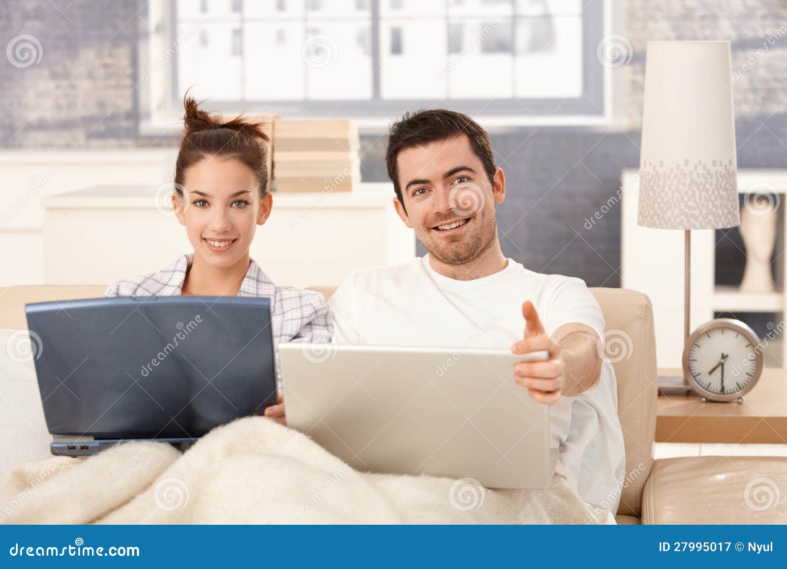 Happy Couple Browsing Internet in Bed at Home Stock Image - Image of ...