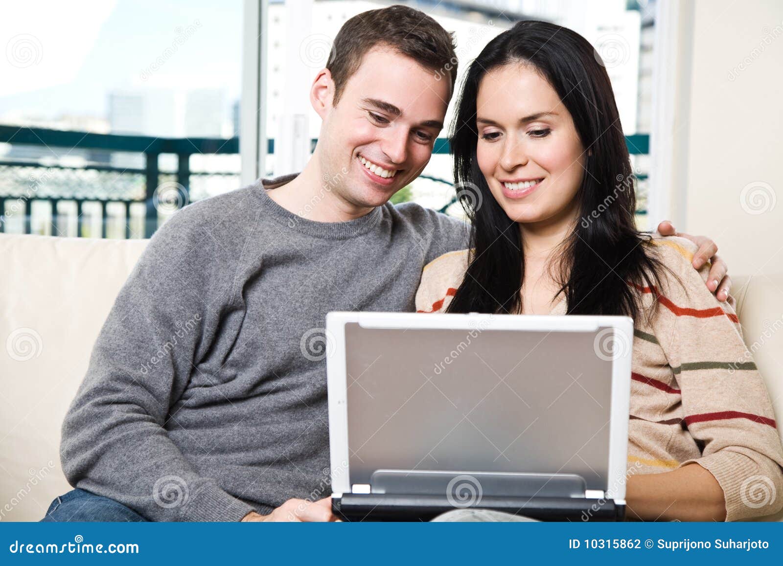 Happy Couple Browsing Internet at Home Stock Photo - Image of beautiful ...