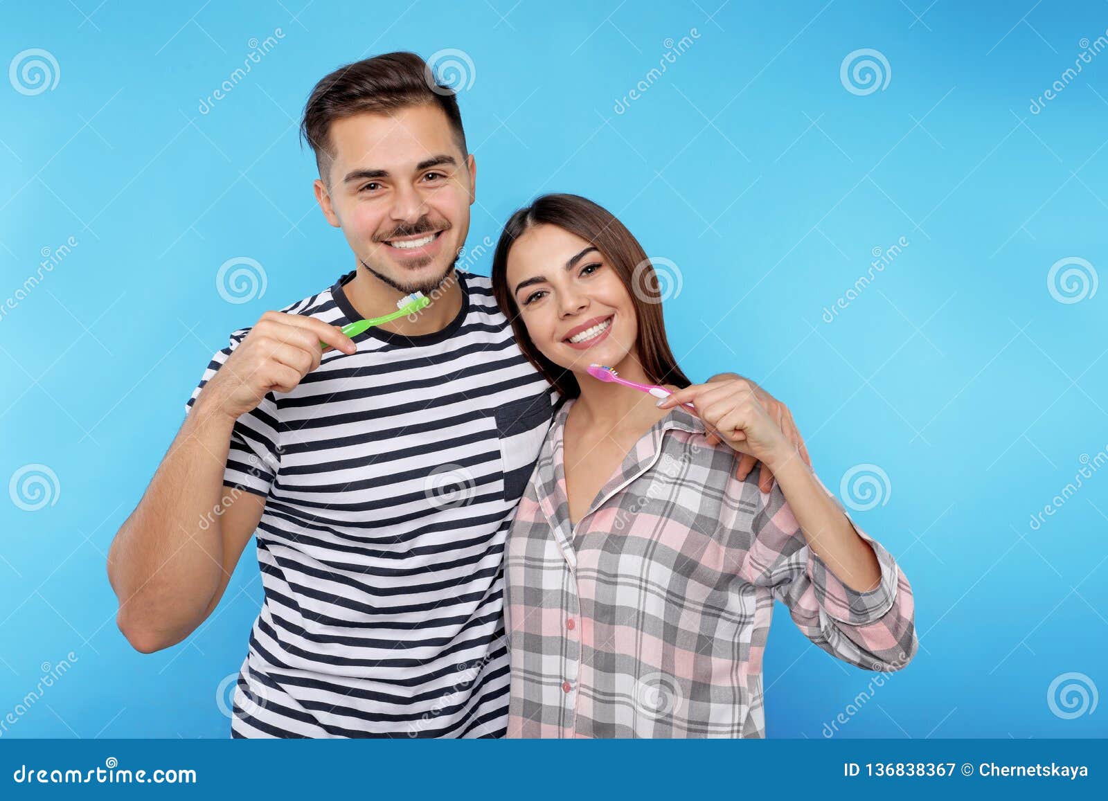 Happy Couple Brushing Teeth Stock Image - Image of oral, people: 136838367