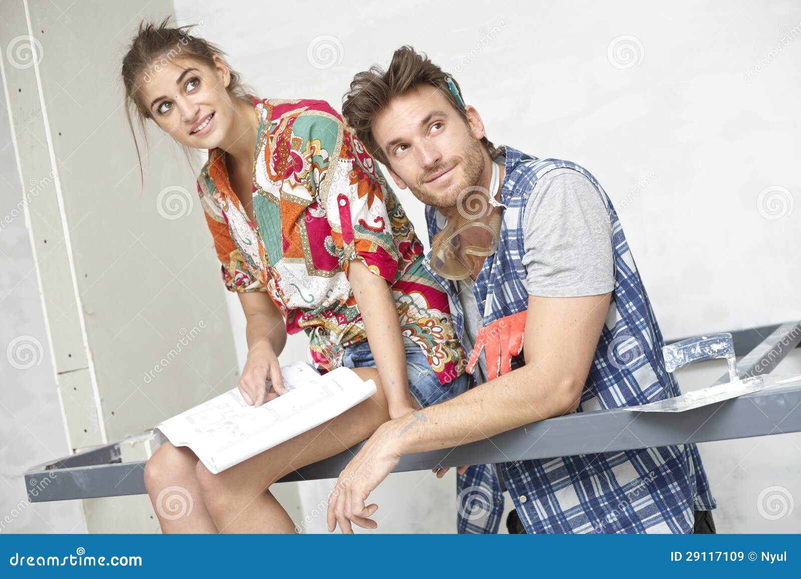 Happy Couple Building New House Stock Image - Image of attractive ...