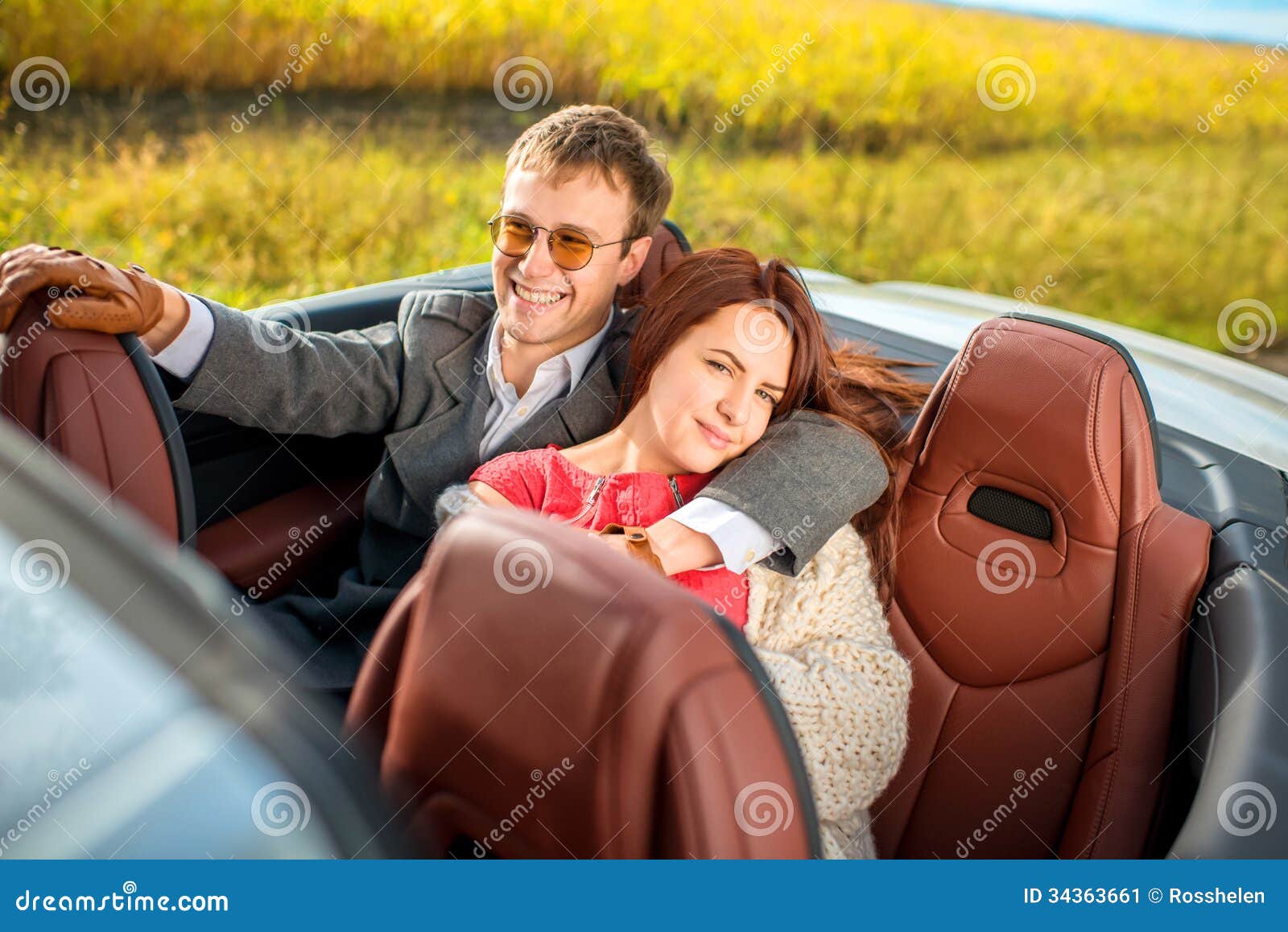 Happy couple in the car stock image. Image of automobile - 34363661