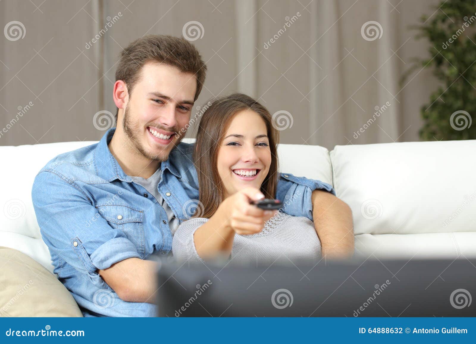Happy Couple Changing Channel on Tv Stock Photo - Image of hand, girl ...