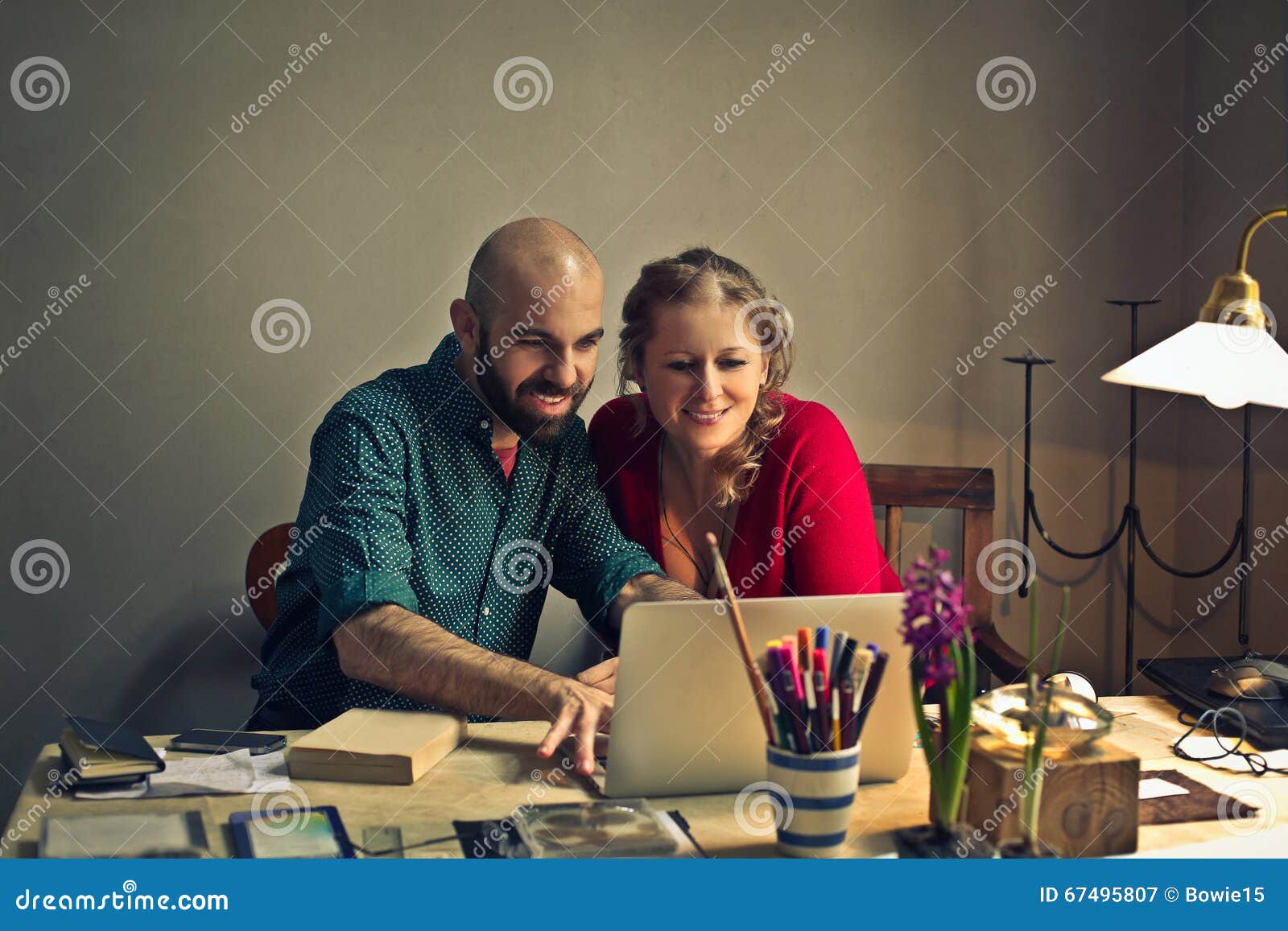 Happy Couple Checking Their Laptop Stock Image - Image of computer ...