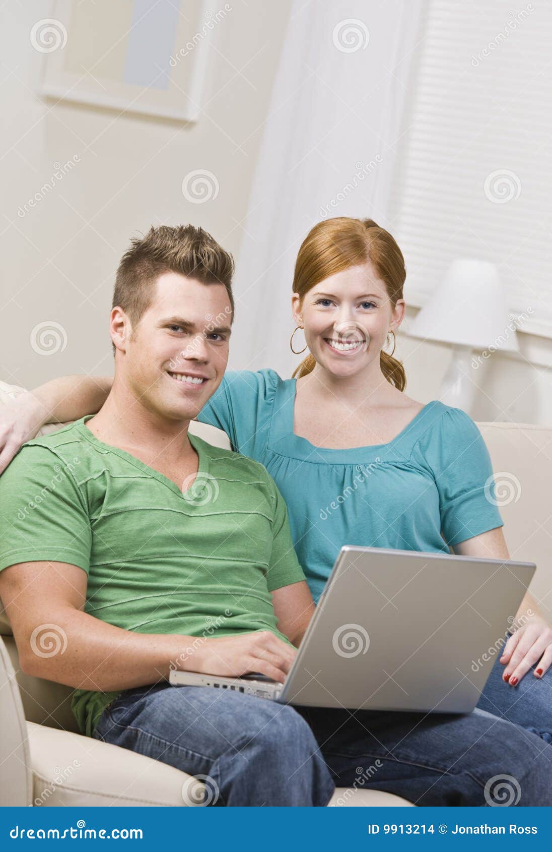 Happy Couple on Computer stock photo. Image of internet - 9913214