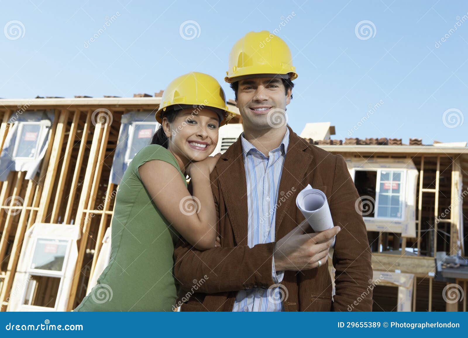 Happy Couple at Construction Site Stock Image - Image of safety, people ...