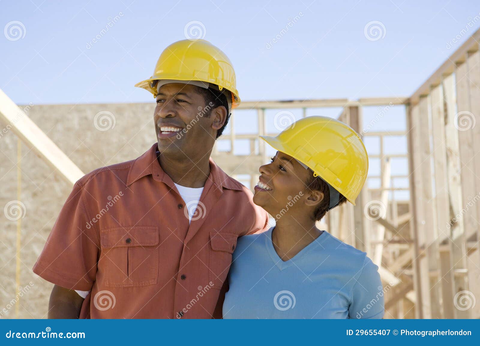 Happy Couple at Construction Site Stock Image - Image of african ...