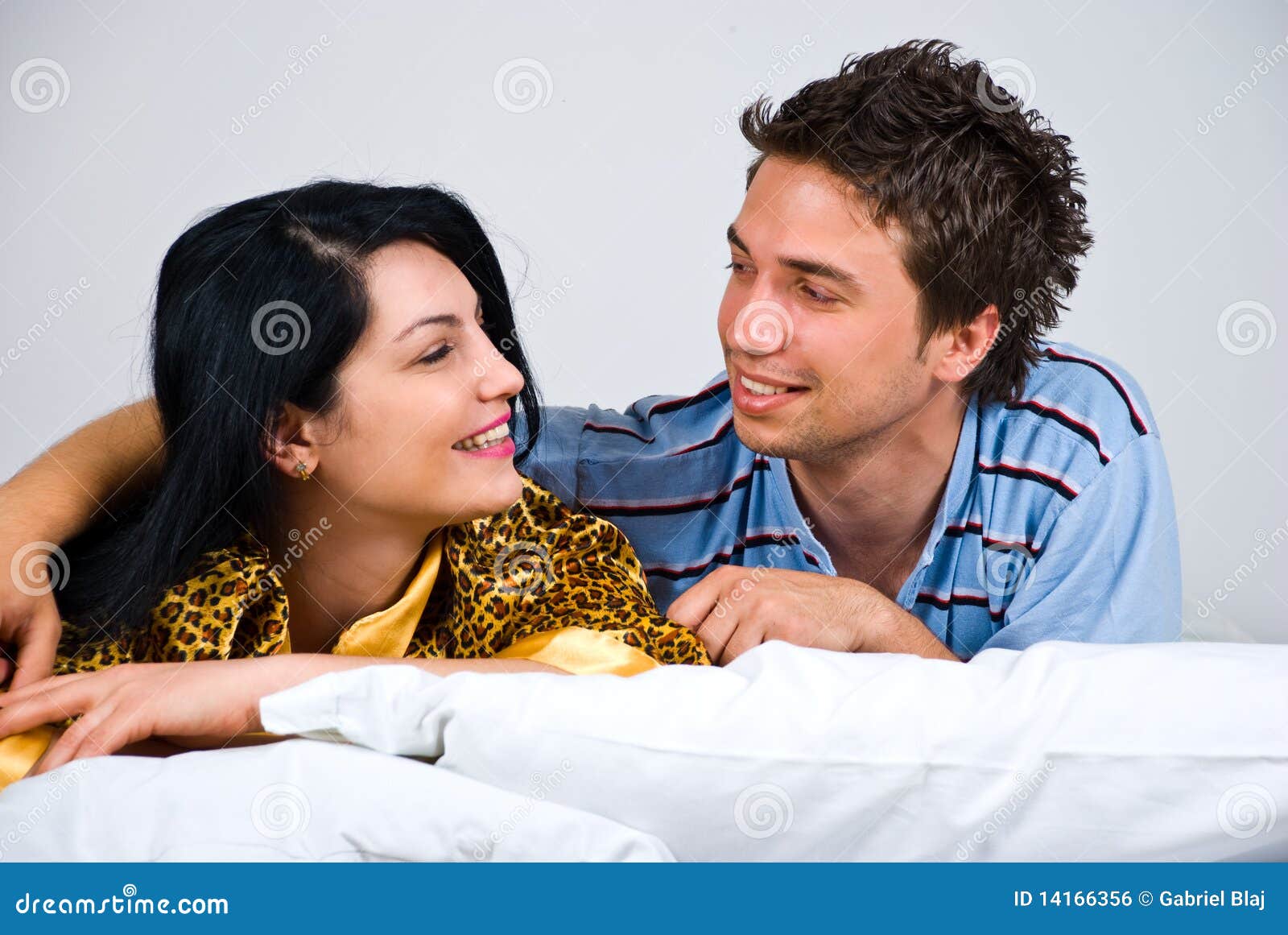 Happy Couple Conversation in Bed Stock Photo - Image of female ...