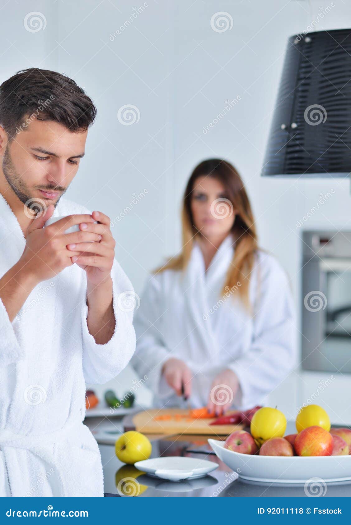 Happy Couple Cooking Breakfast Together in the Kitchen Stock Photo ...