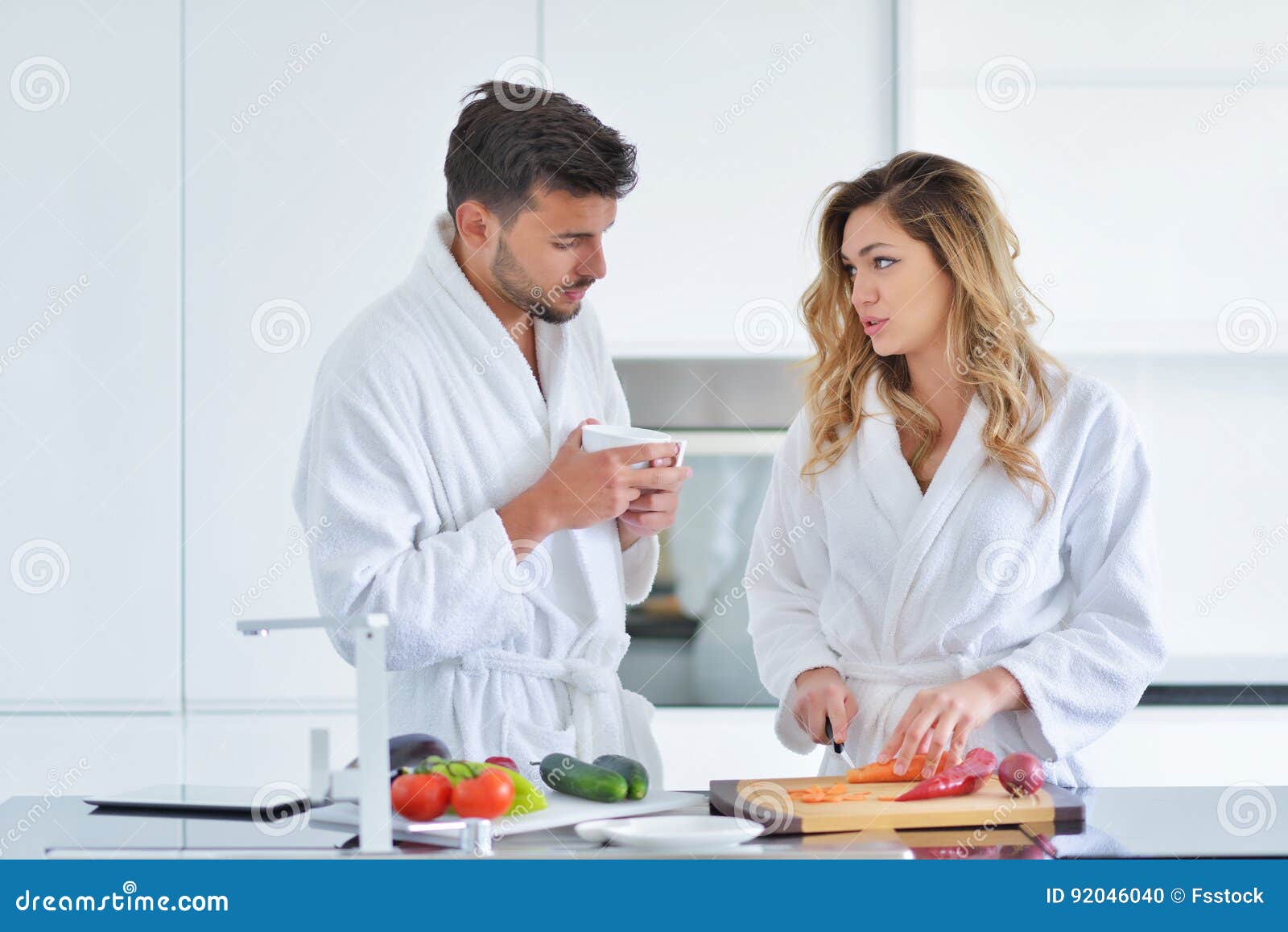 Happy Couple Cooking Breakfast Together in the Kitchen Stock Photo ...