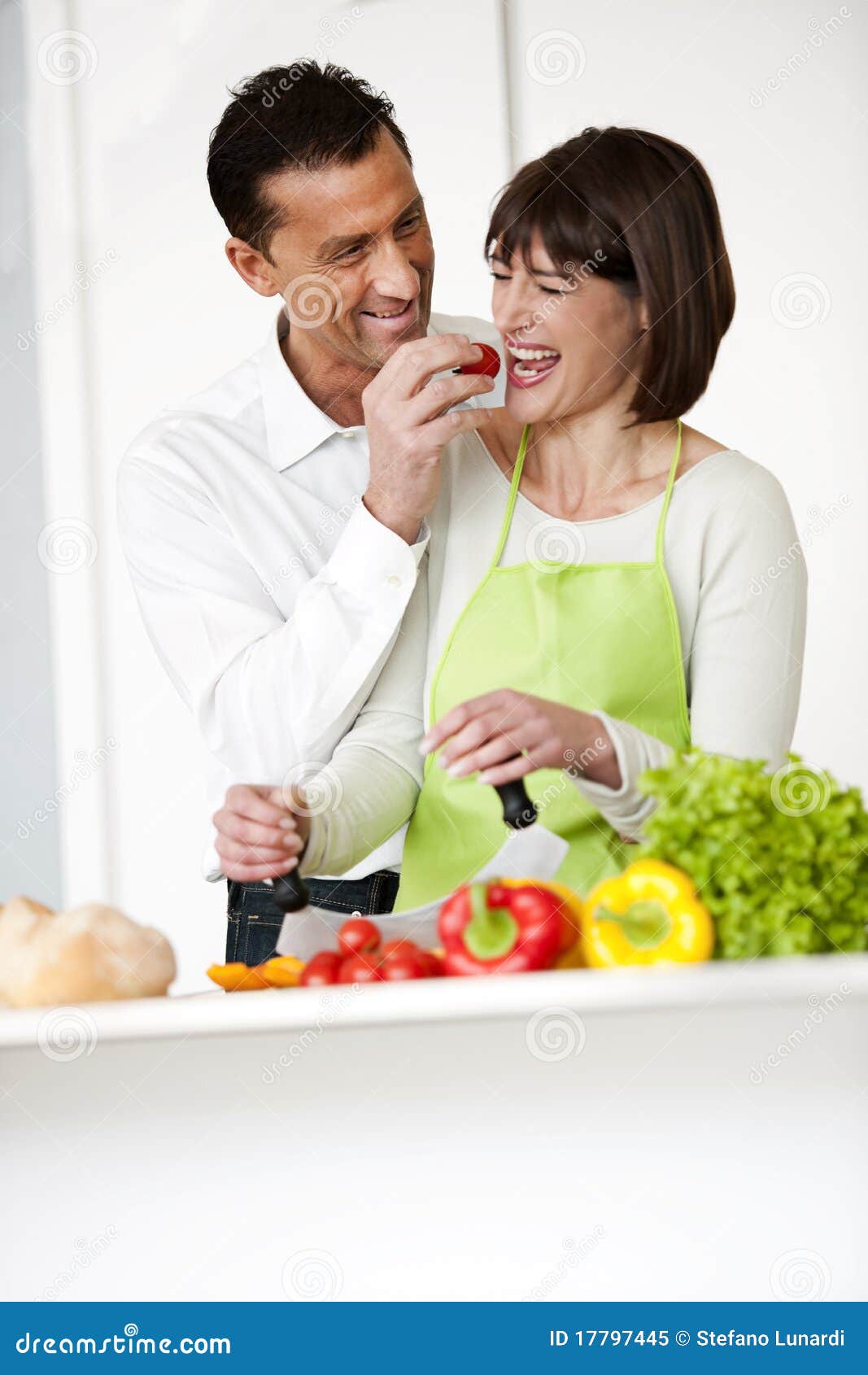 Happy Couple Cooking Together Stock Image - Image of hair, green: 17797445
