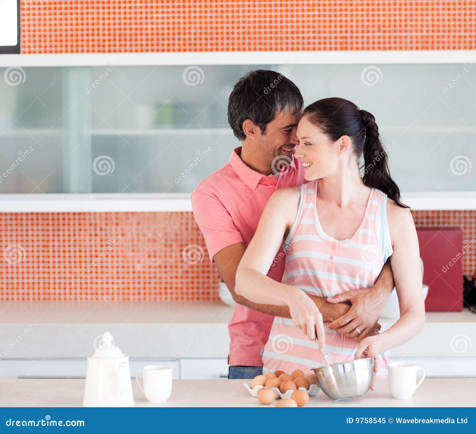 Happy Couple Cooking Together Stock Image - Image of cute, face: 9758545