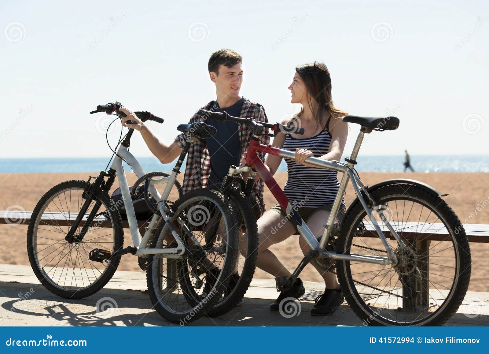 Happy couple after cycling stock photo. Image of lovers - 41572994