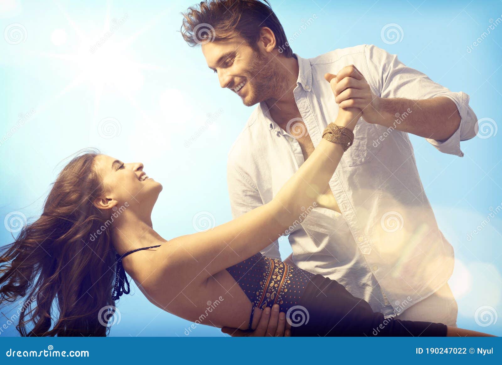 Happy Couple Dancing Outdoors Stock Photo - Image of casual, cheerful ...