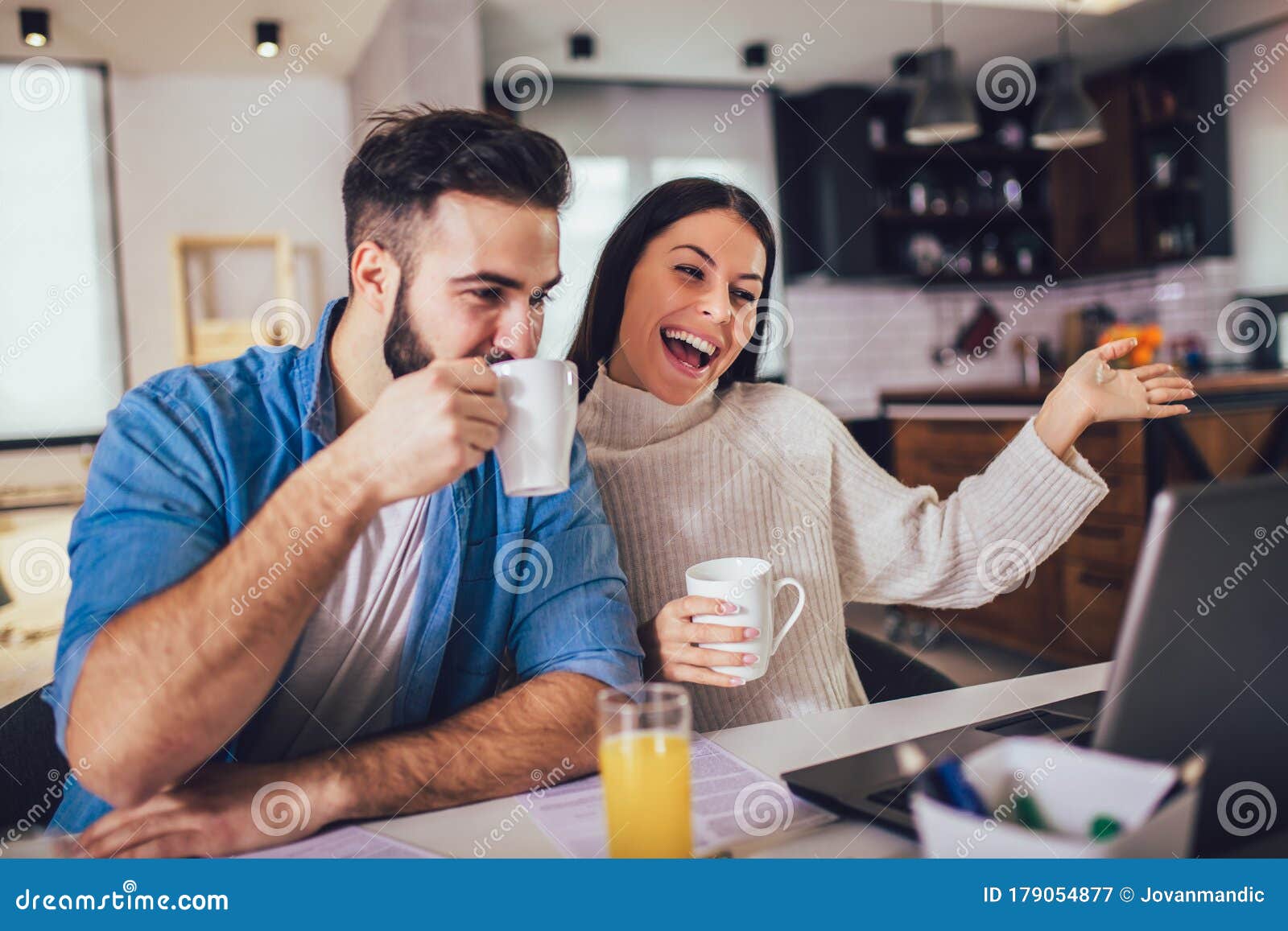Couple Doing Business Together Working at Home on the Laptop Stock ... Couple Doing Business Together Working at Home on the Laptop Stock ...