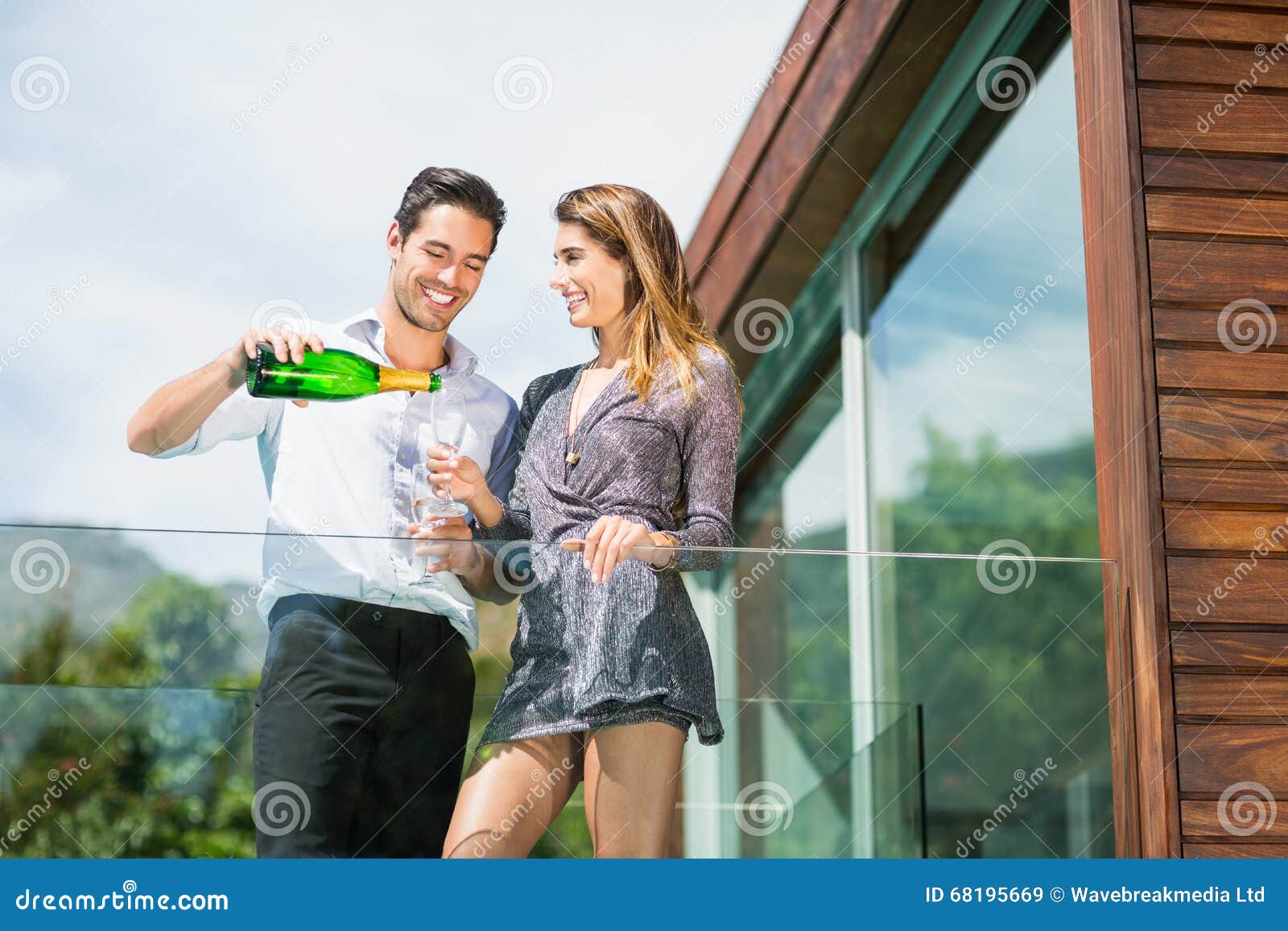 Happy Couple Drinking Champagne at Balcony in Resort Stock Image ...