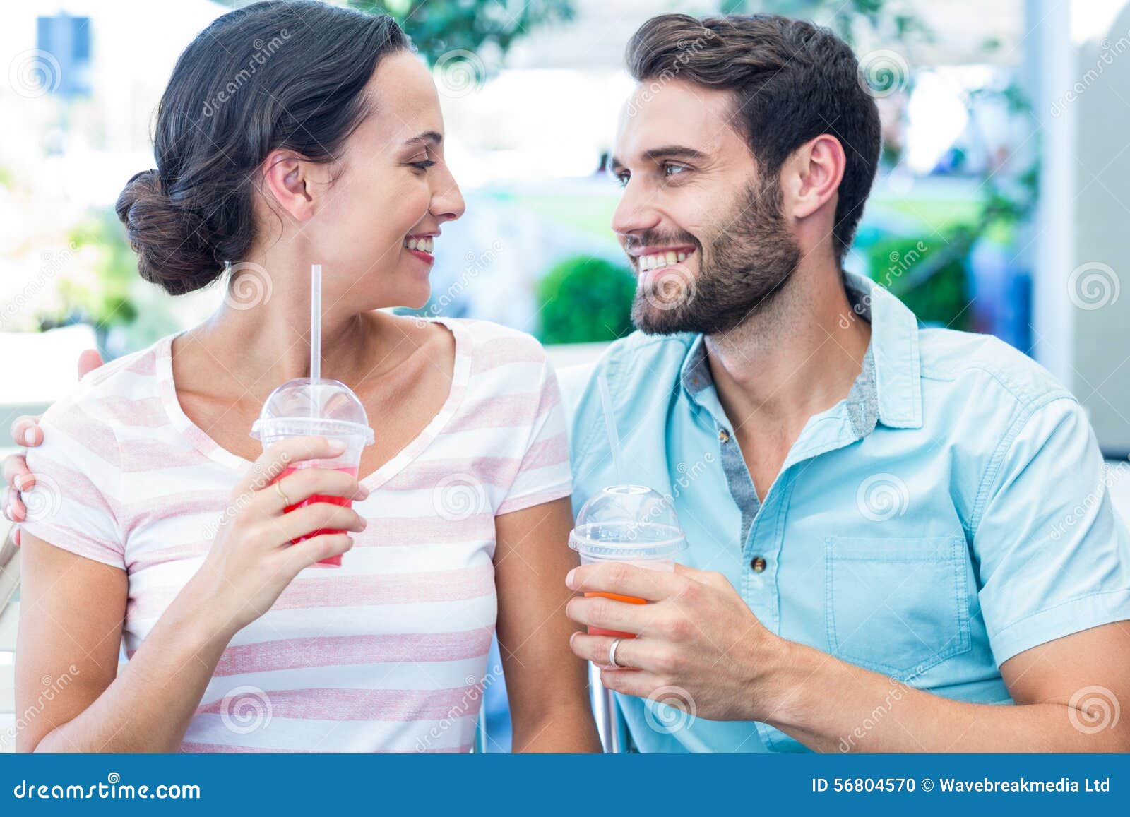 Happy Couple Drinking Milkshakes Together Stock Photo - Image of ...