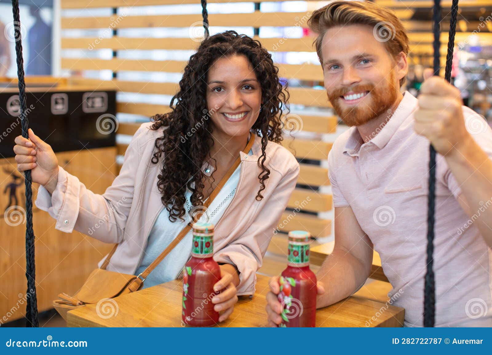 Happy Couple Drinking Shake in Bar I Stock Image - Image of girl, juice ...