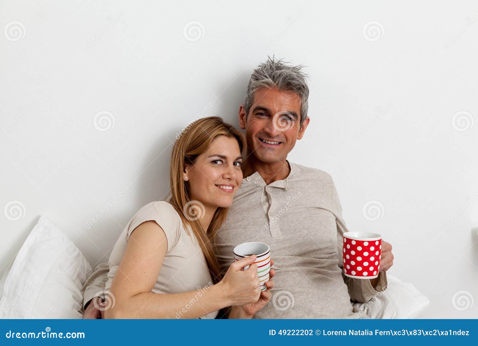 Happy Couple Drinking Tea in the Bed Stock Photo - Image of years, love ...