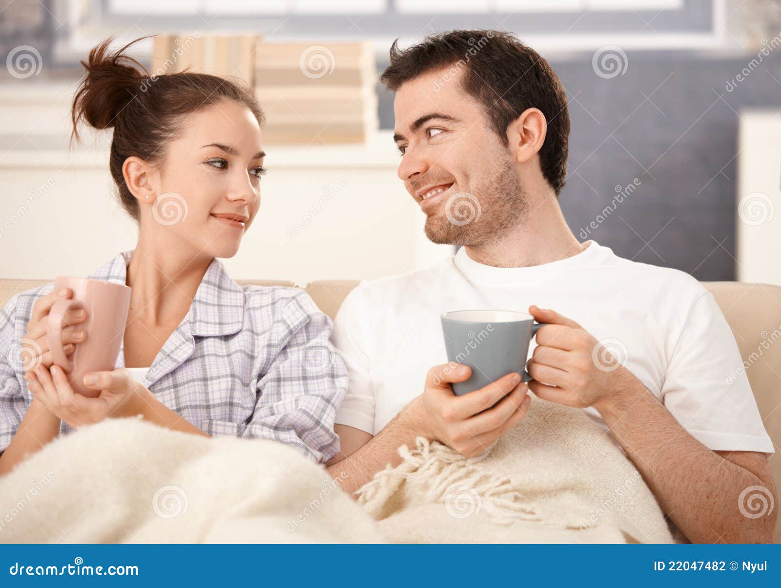 Happy Couple Drinking Tea in Bed Smiling Stock Photo - Image of ...