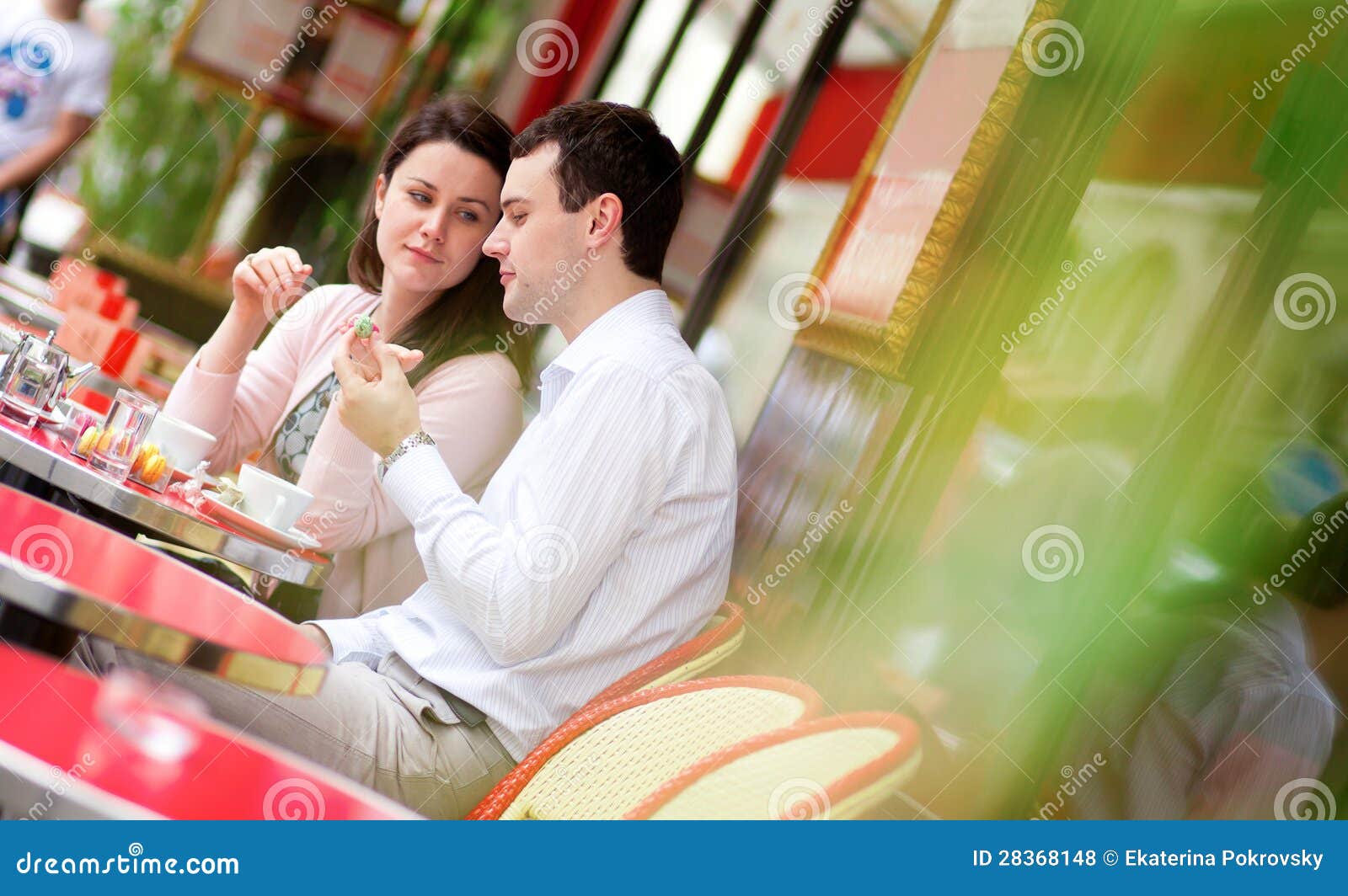 Happy Couple Eating Delicious Macaroons Stock Photo - Image of couple ...