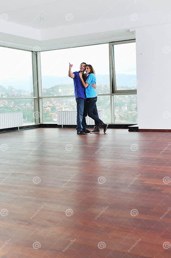 Happy Couple in Empty Apartment Stock Image - Image of emotion, house ...