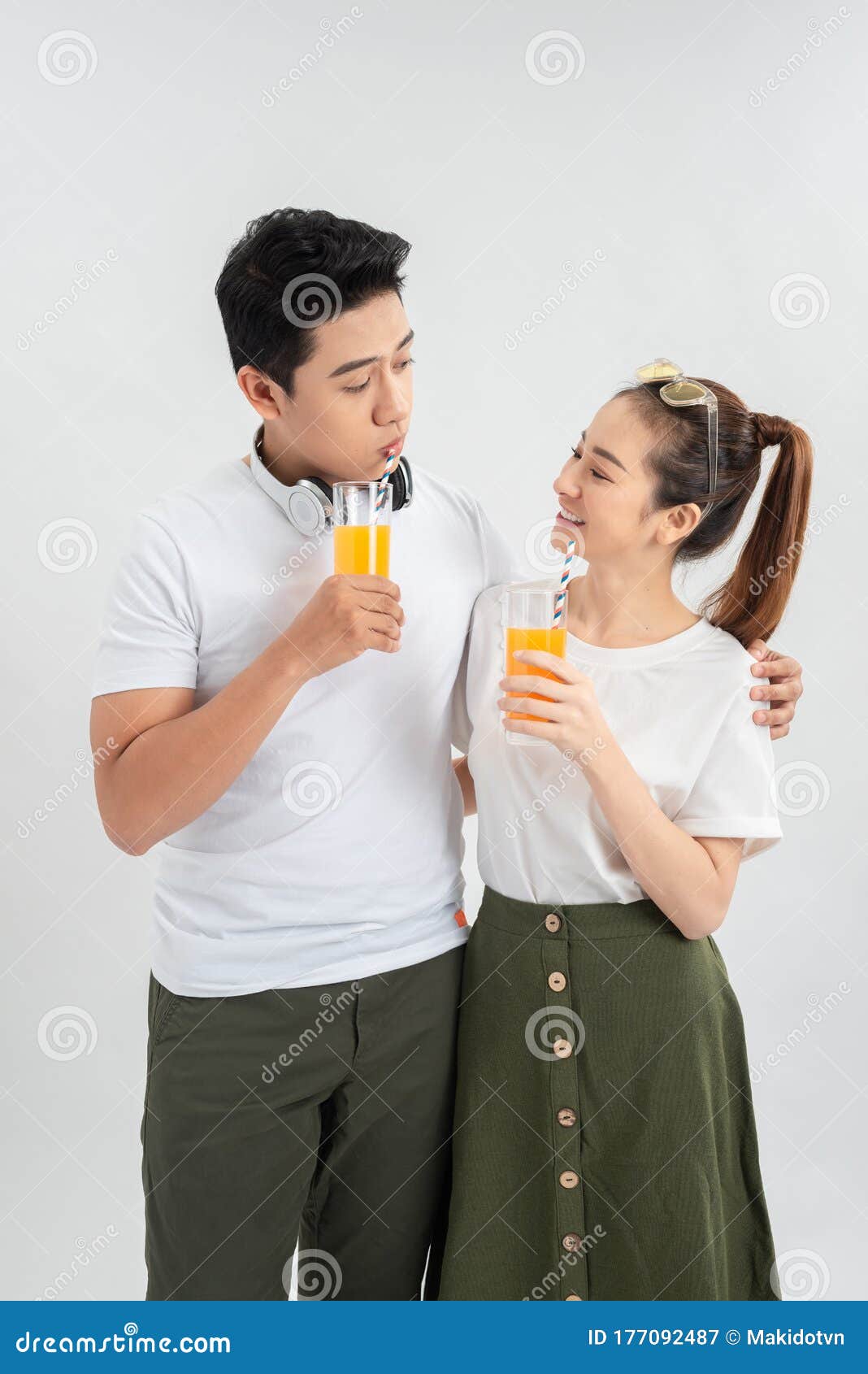 A Happy Couple is Enjoying Some Drinks Together Stock Image - Image of ...