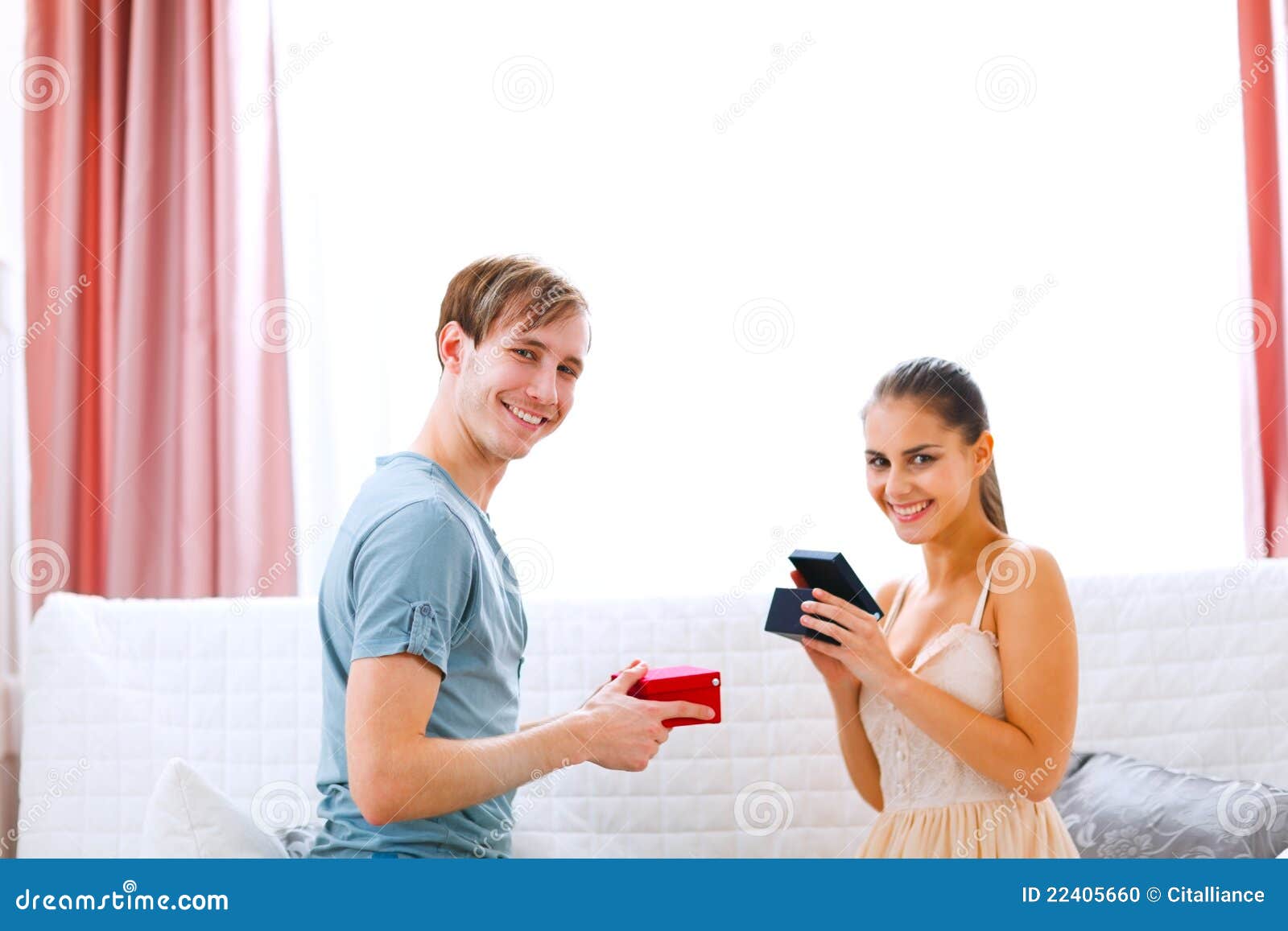 Happy Couple Exchanging Presents Stock Photo - Image of male, female ...