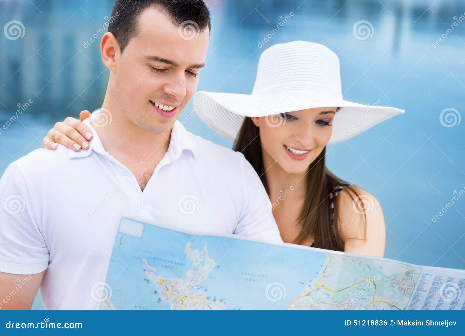 A Happy Couple Exploring a Map on the Sea Stock Photo - Image of ...