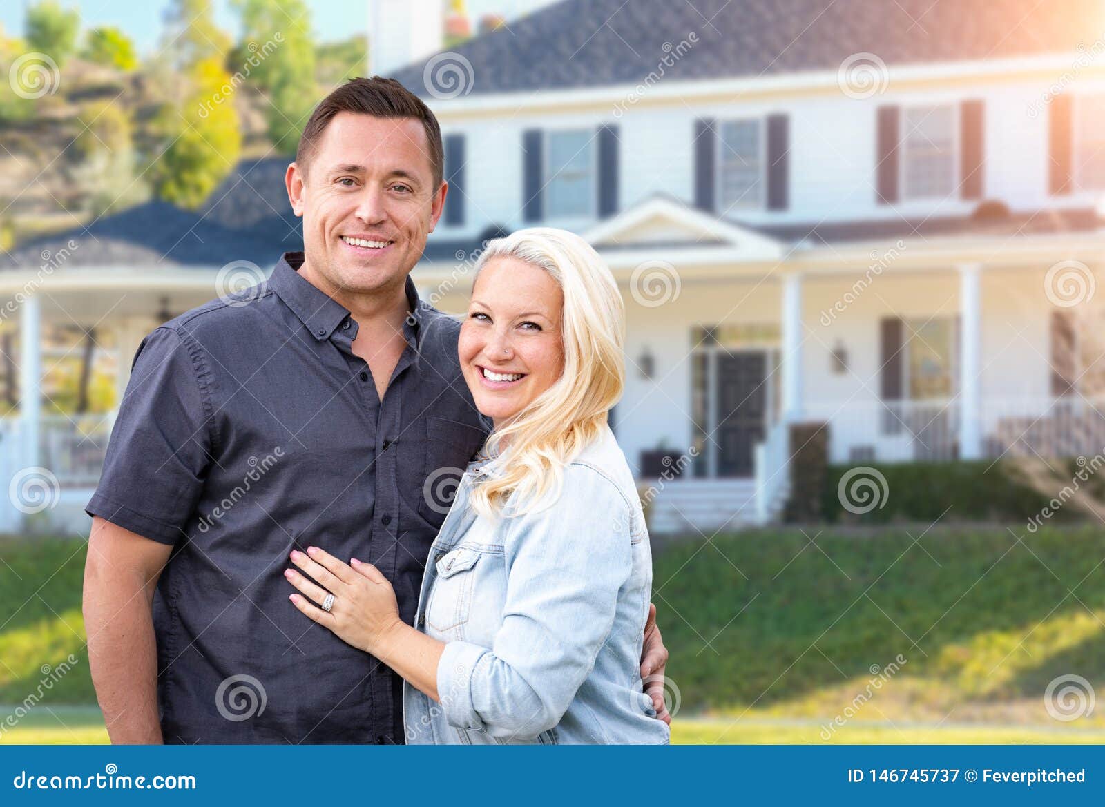 Happy Couple in Front of Beautiful House Stock Image - Image of outside ...