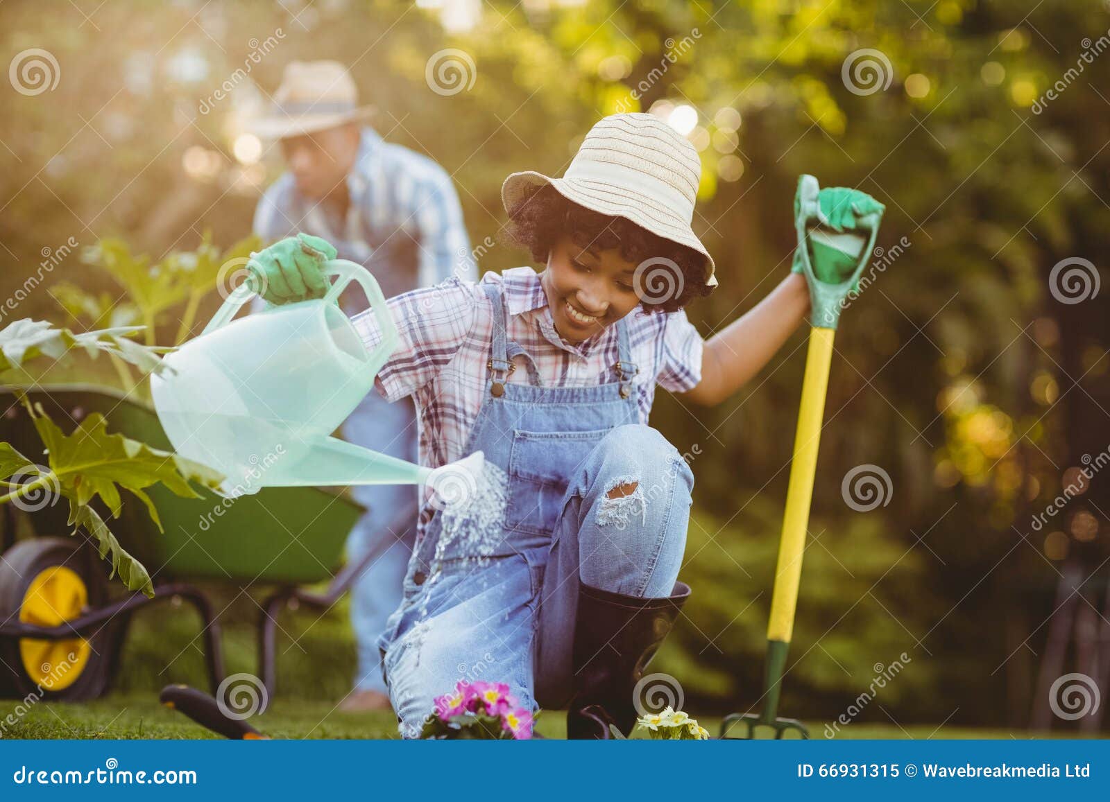 Happy couple gardening stock image. Image of flowers - 66931315