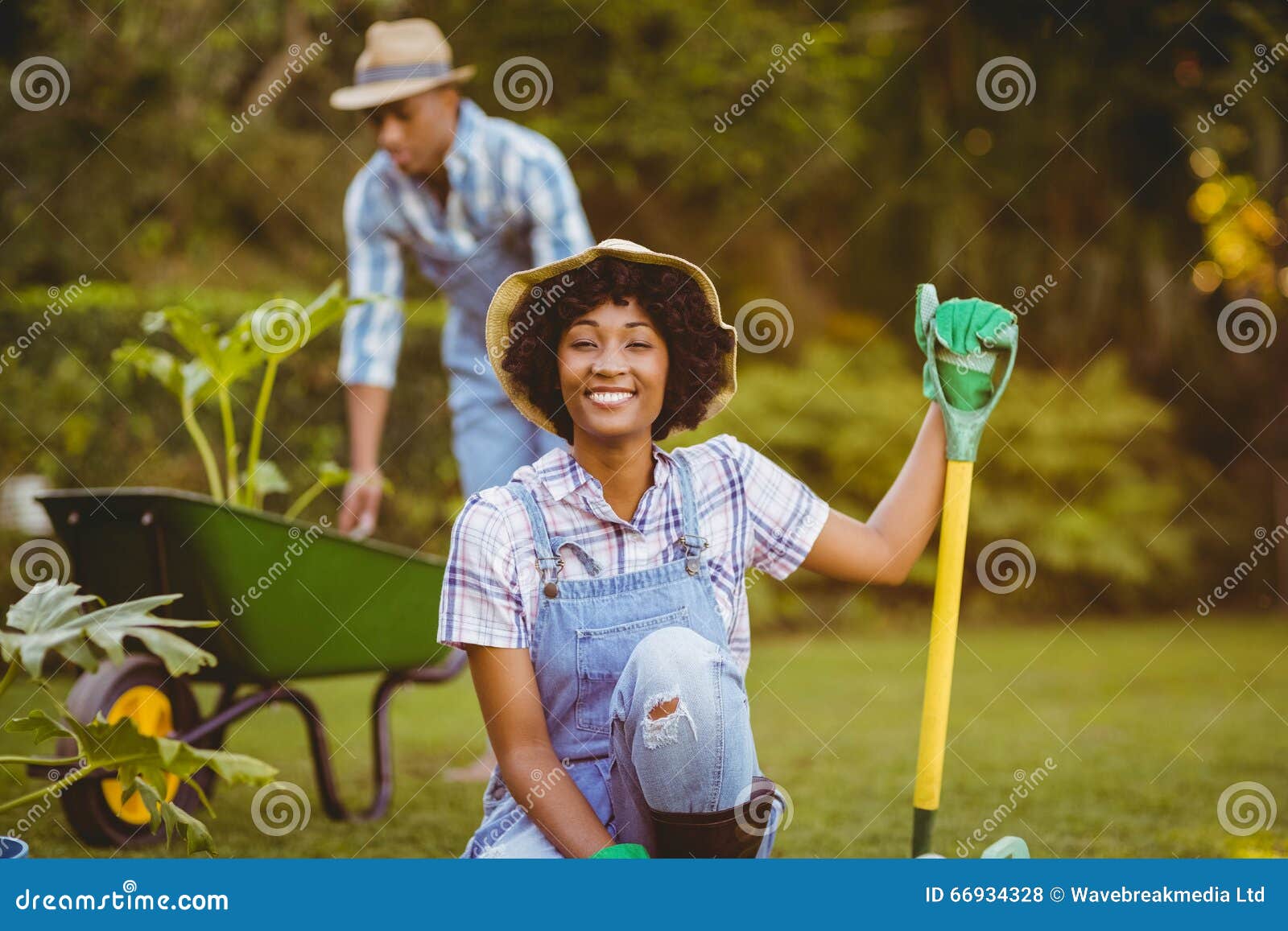 Happy couple gardening stock photo. Image of leisure - 66934328