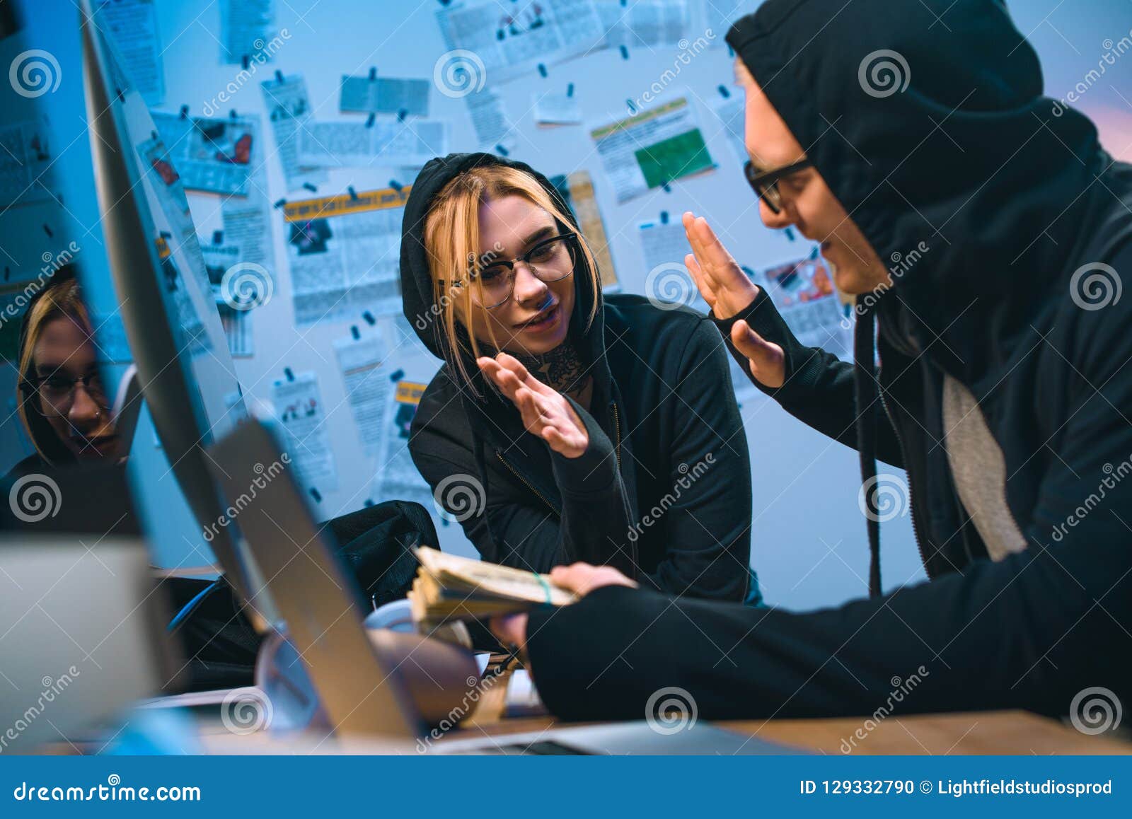 Happy Couple of Hackers with Stack of Cash Giving Stock Photo - Image ...