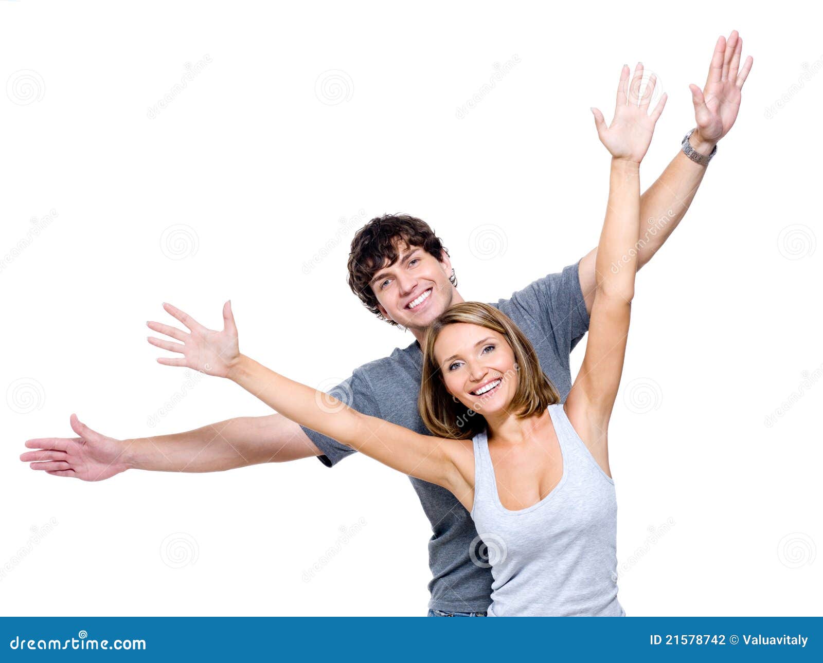 Happy Couple with the Hands Lifted Upwards Stock Photo - Image of ...