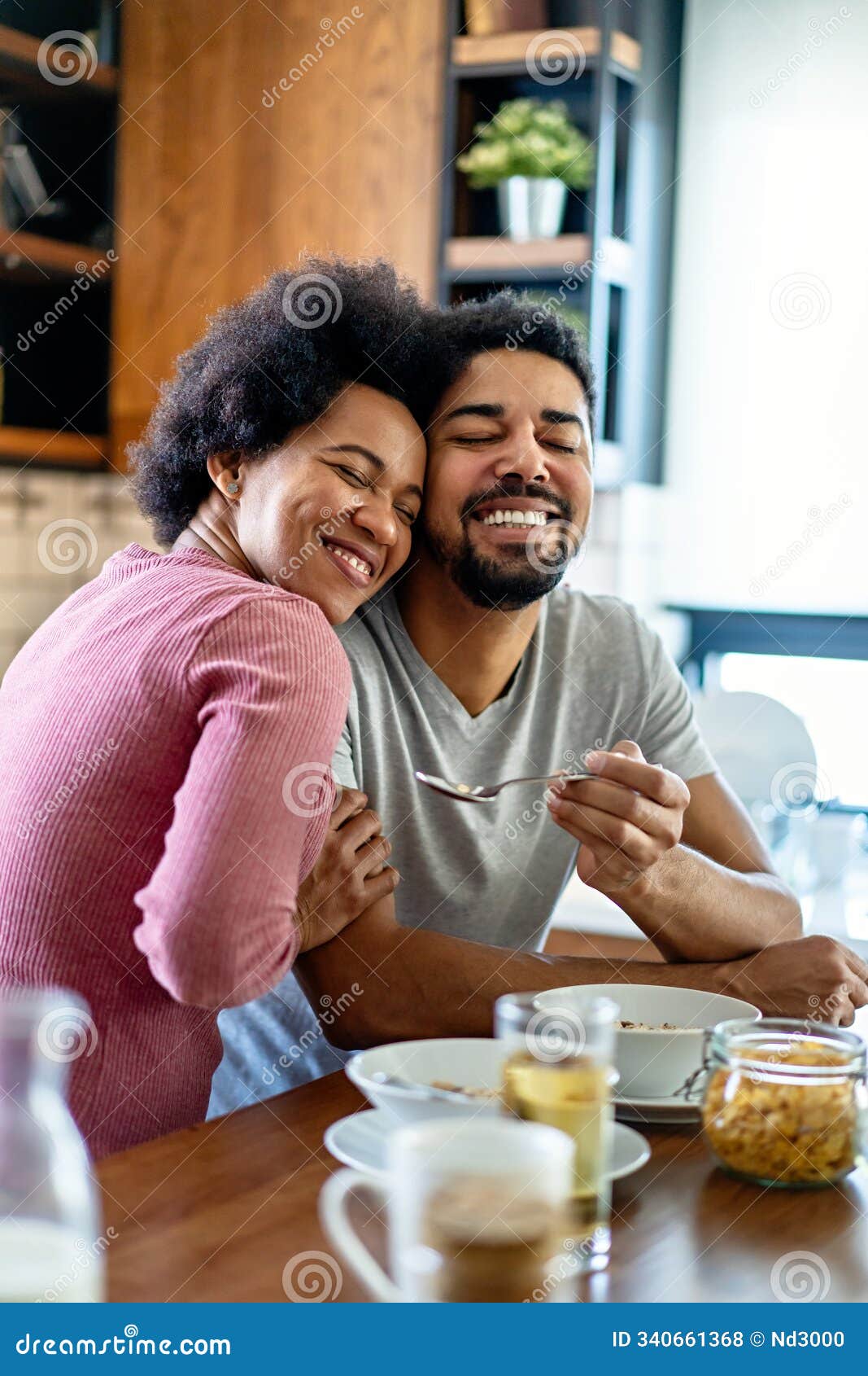 Happy Couple Having Breakfast Together in the Kitchen Stock Photo ...