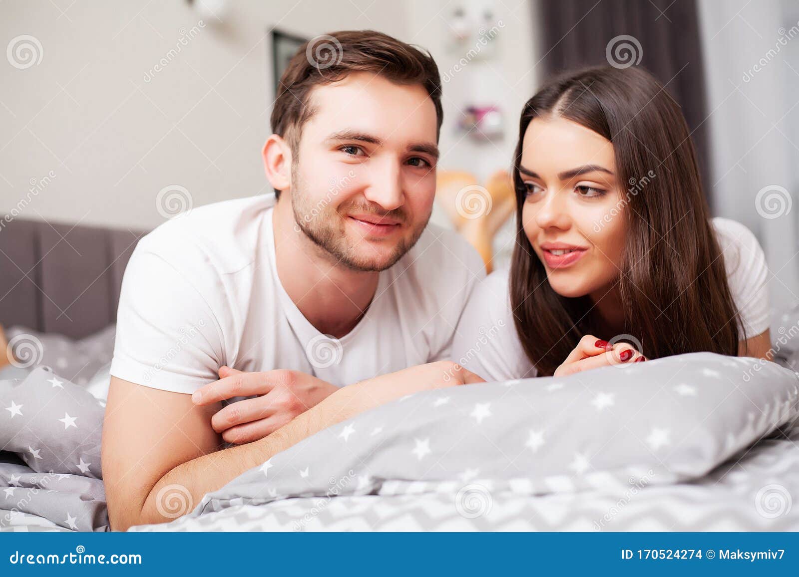 Happy Couple Having Fun In Bed Intimate Sensual Young Couple In