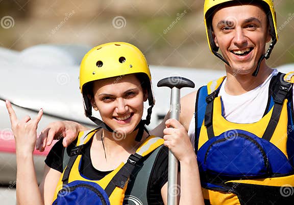 Happy couple with helmets stock image. Image of male - 21875781