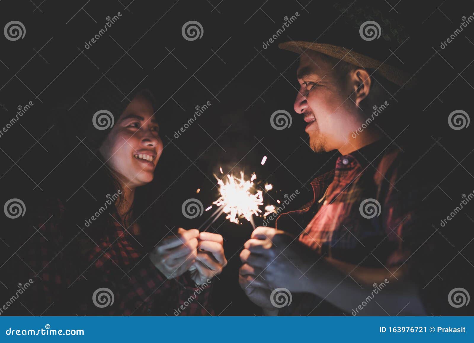 The Happy Couple Hold a Firework Sticks. Stock Image - Image of holiday ...