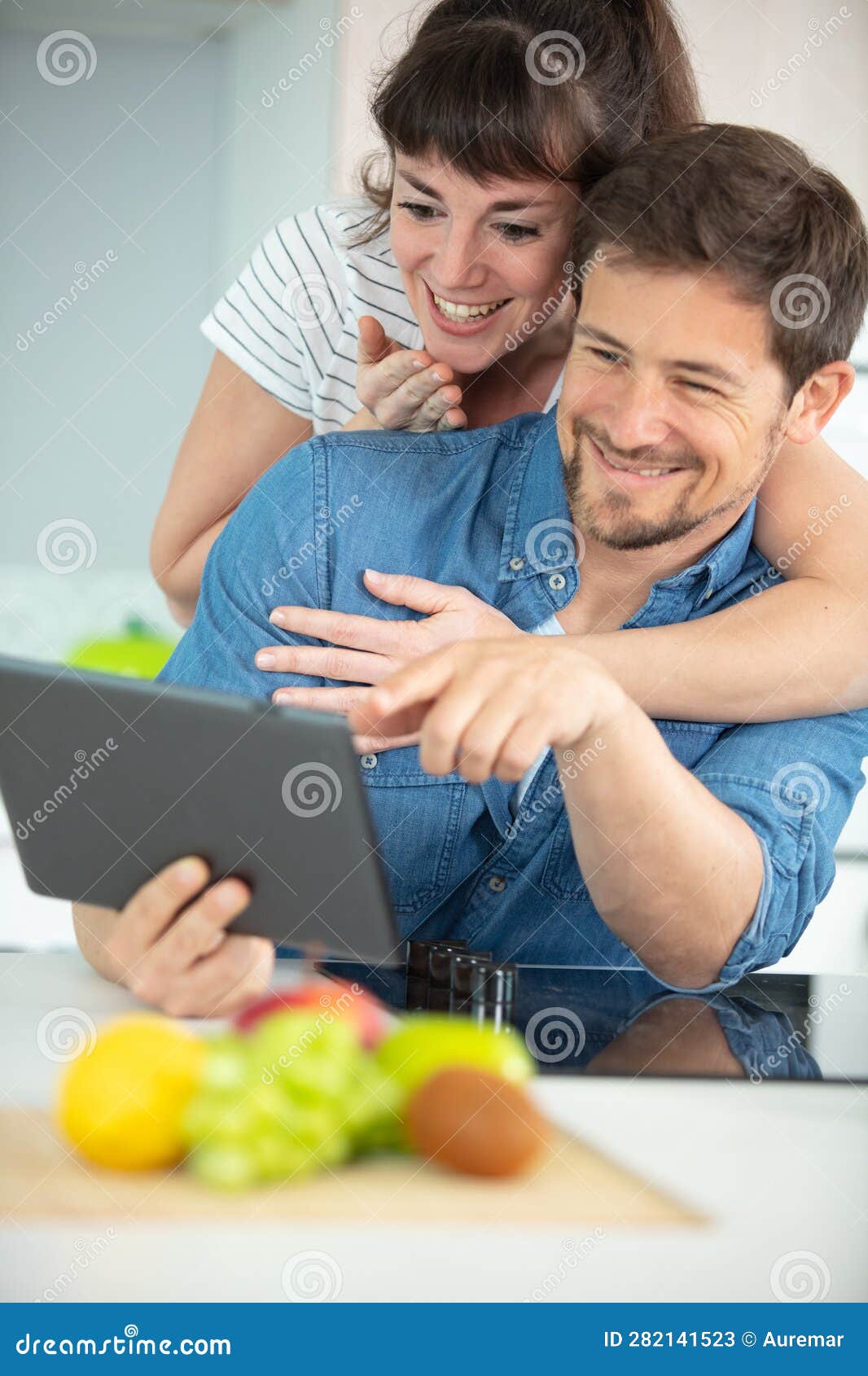 Happy Couple in Home Kitchen Using Electronic Tablet Stock Image - Image of portrait, choosing ...