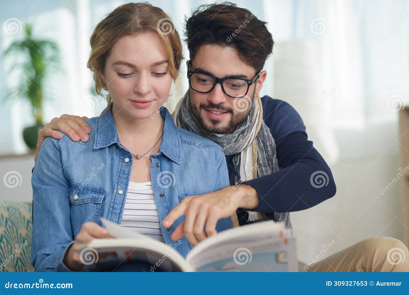 Happy Couple at Home Reading Book Stock Image - Image of husband ...