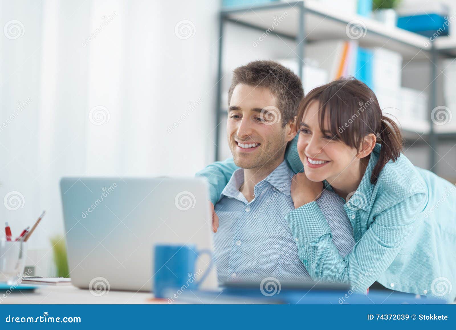 Happy Couple at Home Using a Laptop Stock Image - Image of happy ...