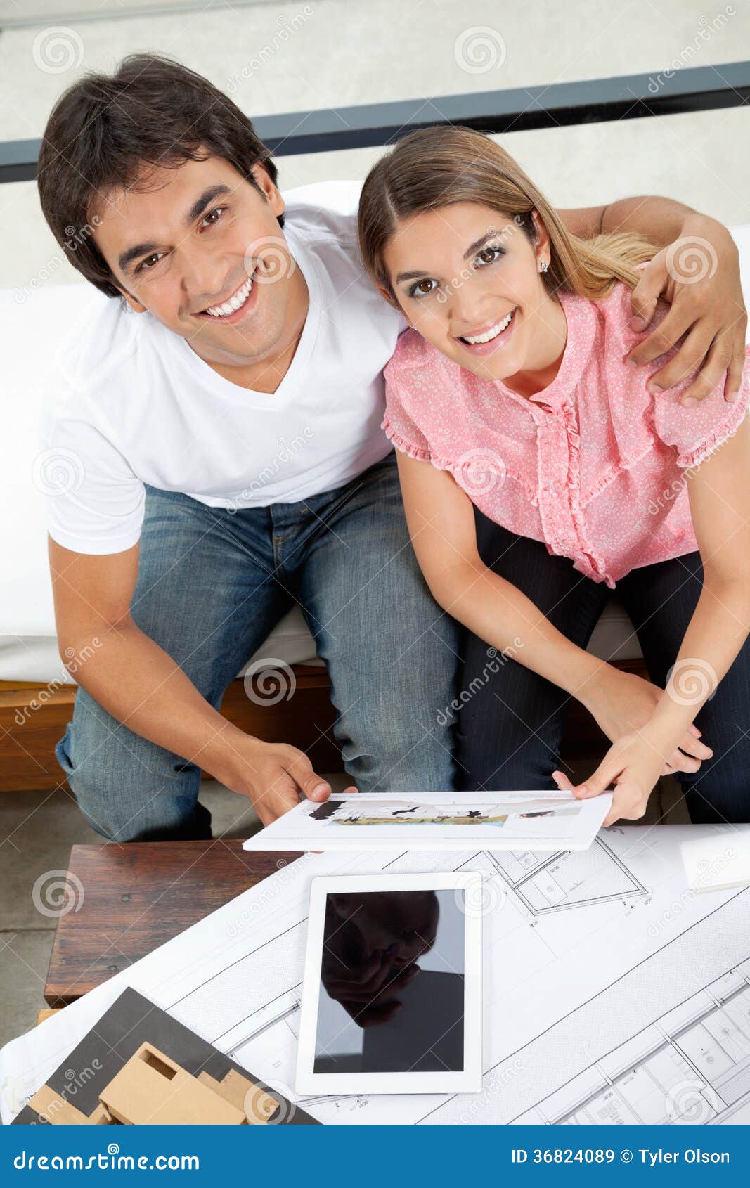 Happy Couple with House Plan Stock Image - Image of digital, caucasian ...