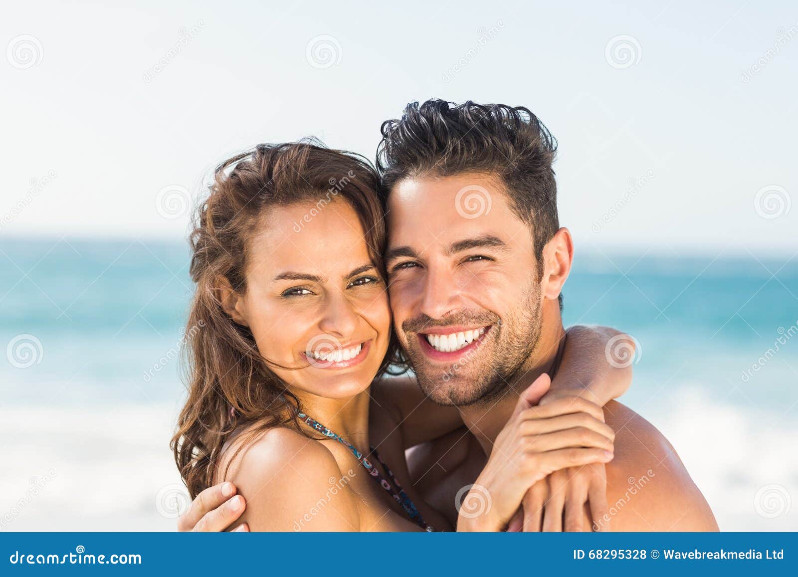 Happy Couple Hugging on the Beach Stock Photo - Image of ocean ...